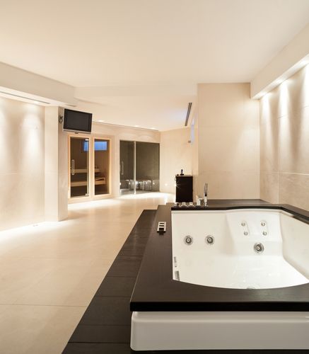 20 Bathroom Jacuzzi Designs for a Lavish Living Space