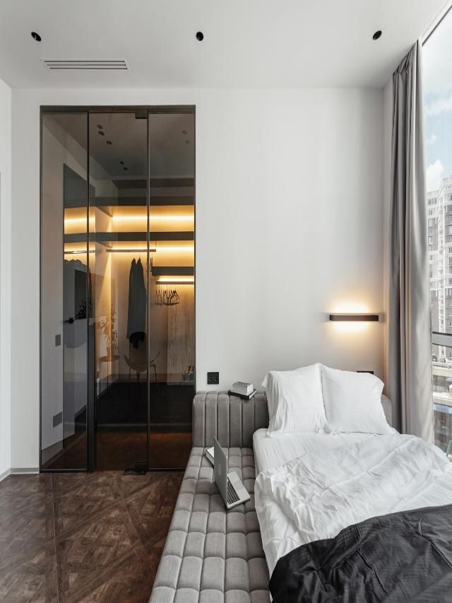 Stay in Trend with 7 Glass Wardrobe Designs