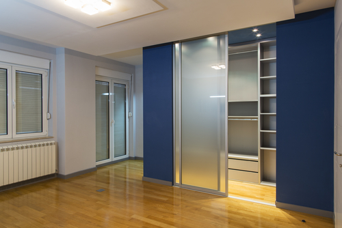 15 Stone Almirah Designs on a Wall with Wooden Front